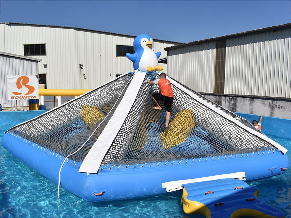 Exciting Inflatable Climbing Experience - Penguin Climber Net | Bouncia